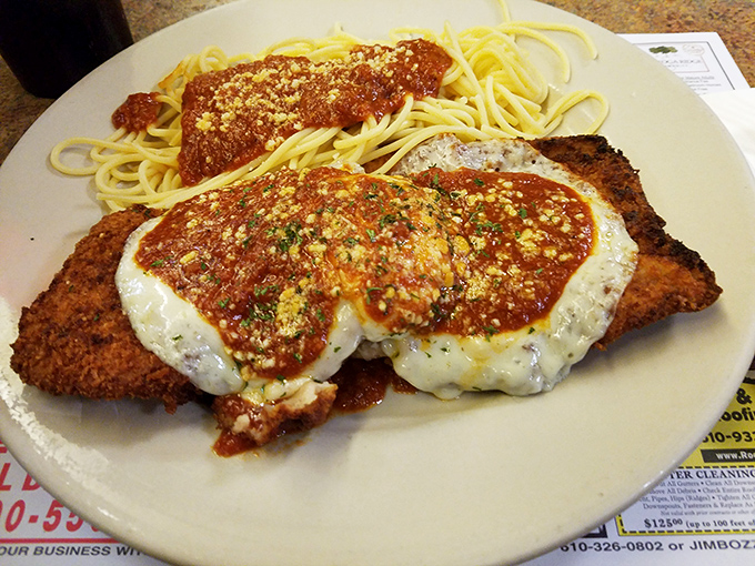 The chicken parmesan doesn't just hang over the edge of the plate&mdash;it declares itself the heavyweight champion of lunch options.