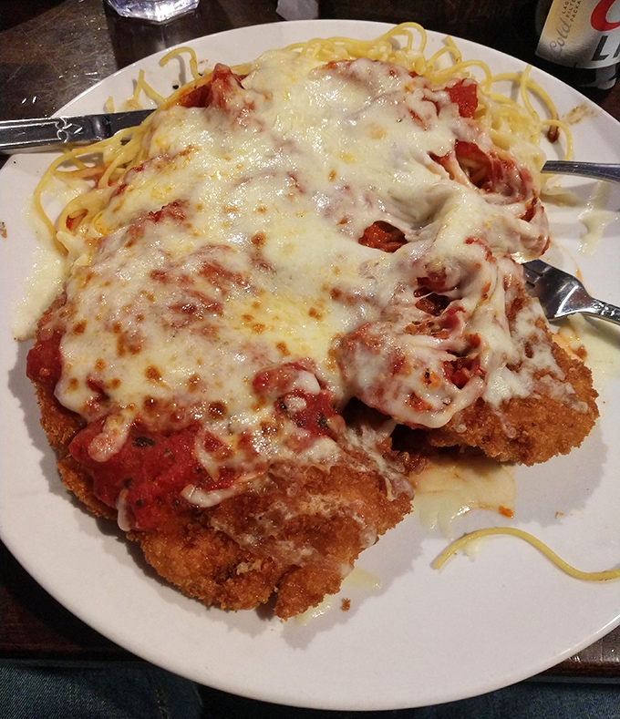 Chicken parmesan that looks like it stepped off the set of a feel-good Italian family movie.