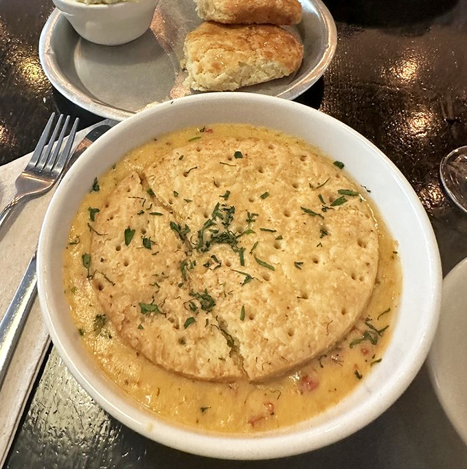 Comfort food gets a gourmet makeover with this heavenly chicken pot pie topped with flaky biscuit.