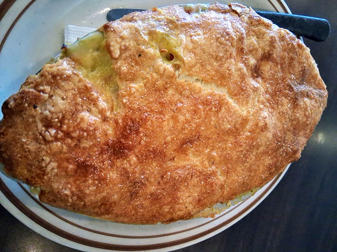 Golden, flaky crust hiding a savory treasure within. This chicken pot pie doesn't just comfort the soul&mdash;it gives it a warm bear hug.