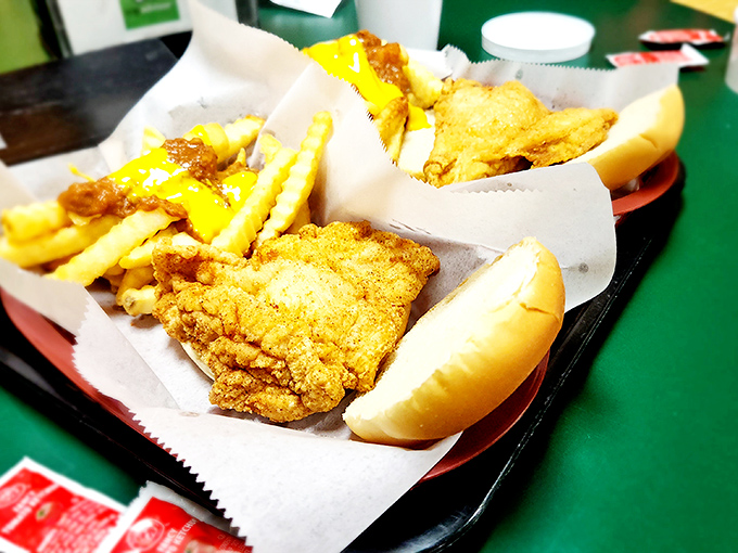 Golden-fried chicken perfection nestled alongside cheese-drenched fries. Diet books should include a chapter called "Worthy Exceptions."
