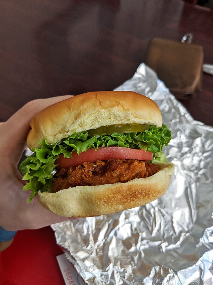 The chicken sandwich that doesn't need social media hype. Fresh lettuce, tomato, and that perfectly fried chicken create a handheld masterpiece.