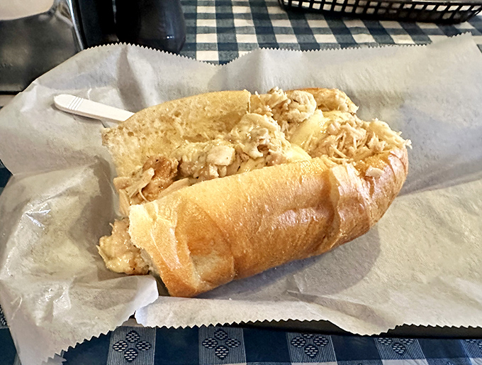 The chicken sandwich that launched a thousand napkins. Golden, overflowing, and demanding your full attention and both hands.