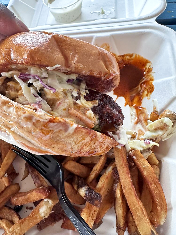 This chicken sandwich with slaw isn't just lunch—it's edible architecture. The perfect balance of crispy, creamy, and "why-yes-I-will-need-extra-napkins."