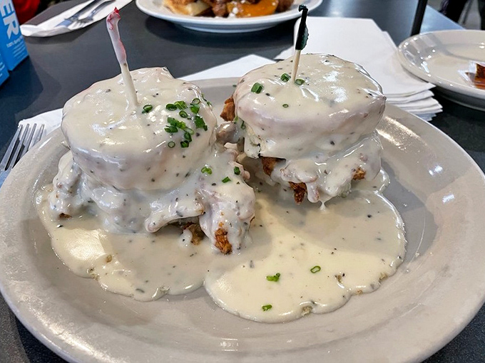 Smothered in gravy and topped with chives, these biscuits aren't just breakfast &ndash; they're an edible Southern love letter.