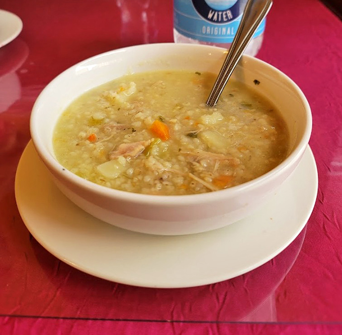A bowl of chicken soup that could cure everything from the common cold to existential dread. Comfort in liquid form.