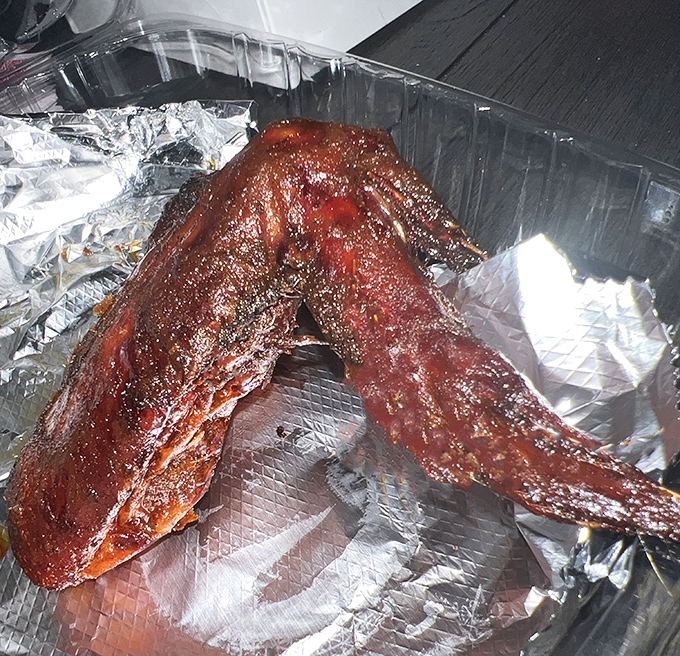 These ribs aren't falling off the bone&mdash;they're choosing to leave it because the journey was so delicious. The glossy sauce is practically winking at you.