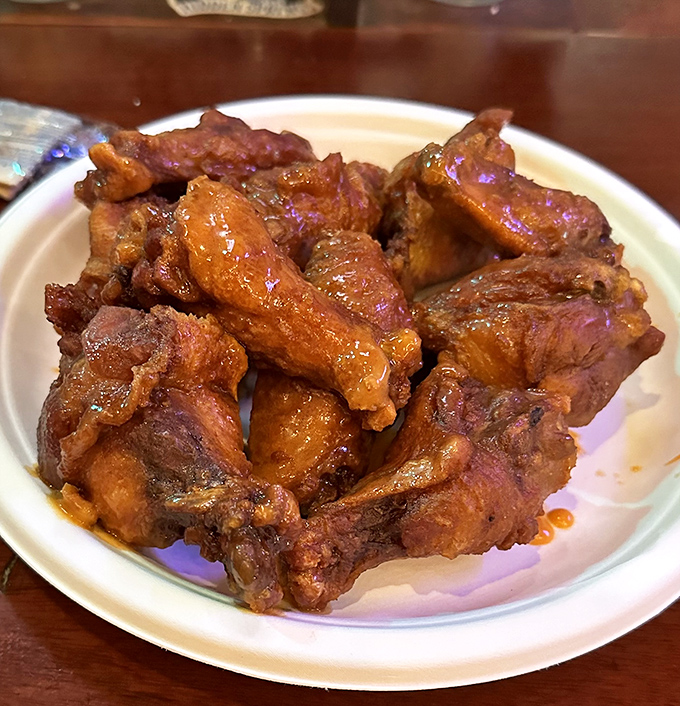 Buffalo wings that don't need Buffalo's approval. These crispy, sauce-slathered beauties speak a universal language of deliciousness.