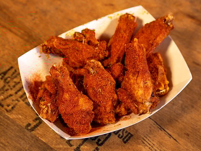 These wings aren't just crispy&mdash;they're life-affirming. The kind of deep orange-red that whispers, "You might need extra napkins, but it'll be worth it." 