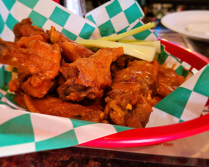 Buffalo wings that don't mess around. Crispy, saucy, and served with the obligatory celery sticks&mdash;nature's way of pretending you're eating healthy.