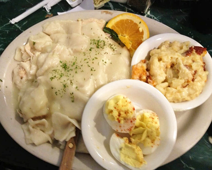Chicken and dumplings that would make your grandmother both jealous and proud, with sides that refuse to be mere afterthoughts.