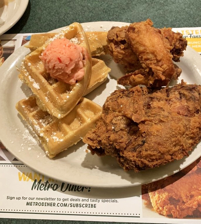 Chicken and waffles: the Romeo and Juliet of breakfast foods, but with a much happier ending. That strawberry butter is the supporting character who steals the show.