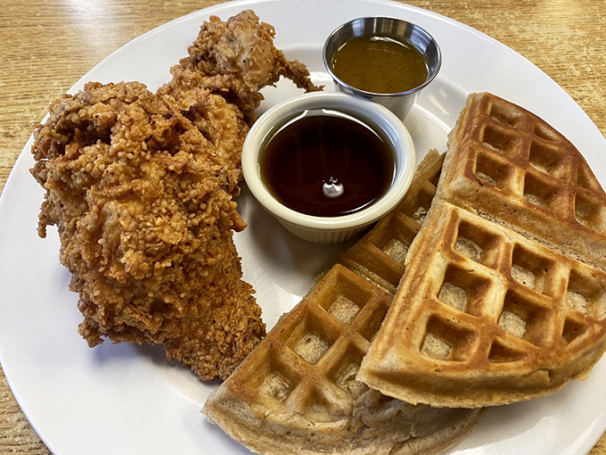 Chicken and waffles: the ultimate Southern power couple. That golden-fried pecan chicken alongside a cinnamon waffle creates a sweet-savory symphony worth waking up for.