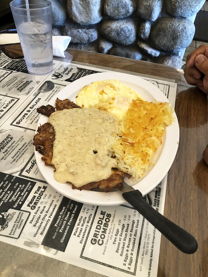 Country fried steak smothered in gravy &ndash; where the coating shatters with each bite and the gravy could make cardboard taste delicious.