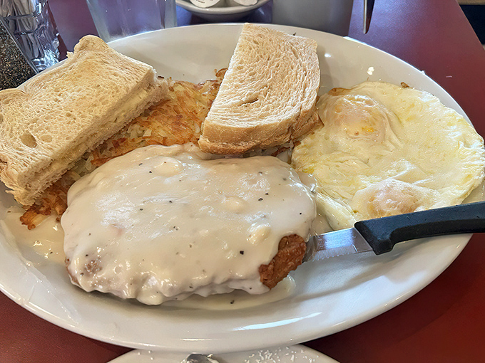 Country gravy blankets this chicken fried steak like a comforting hug from your favorite aunt&mdash;the one who never worried about cholesterol.