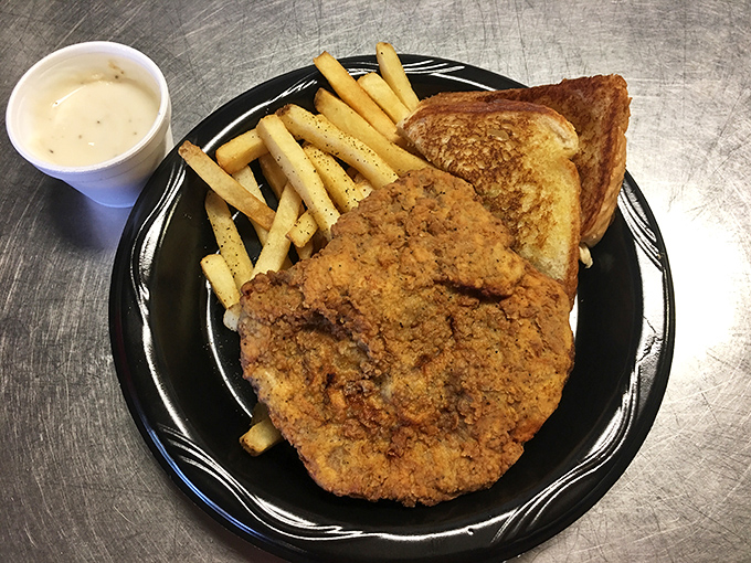 This chicken fried steak has clearly been raised right&mdash;crispy exterior, tender inside, and taking up residence on a plate that barely contains its greatness.