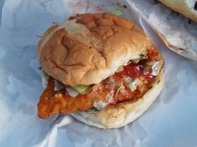 Not just another chicken sandwich, but a flavor bomb disguised as lunch. That golden-crusted poultry deserves its own fan club.