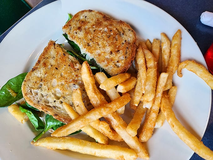 This chicken sandwich towers like a delicious skyscraper built entirely for your taste buds' pleasure.