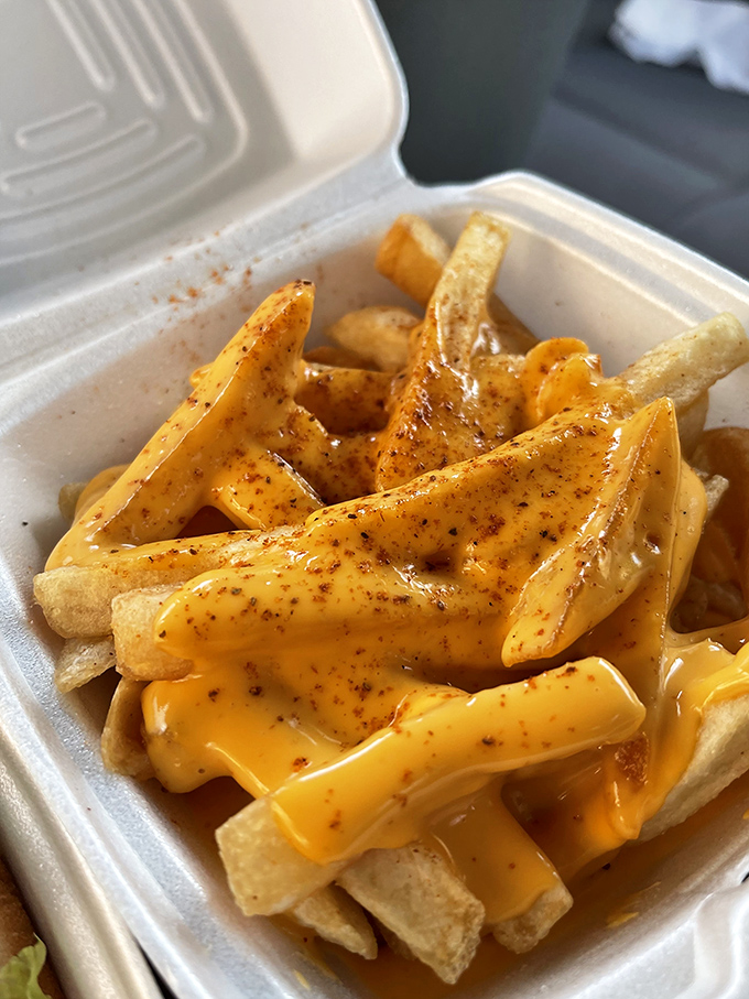 Golden fries swimming in cheese sauce&mdash;the Olympic event your stomach has been training for all year. 