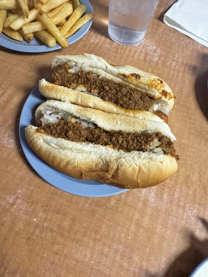 Chili dogs with diced onions&mdash;the kind that make you forget about table manners. Some meals are worth the napkin investment.