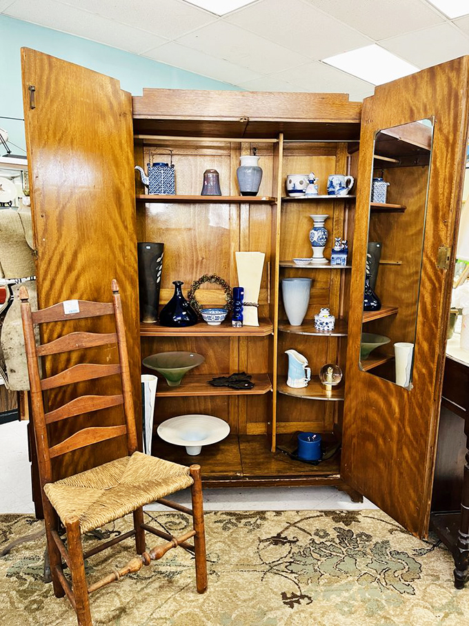 This wooden cabinet doesn't just display ceramics and glassware—it's a time capsule of dinner parties and special occasions past.