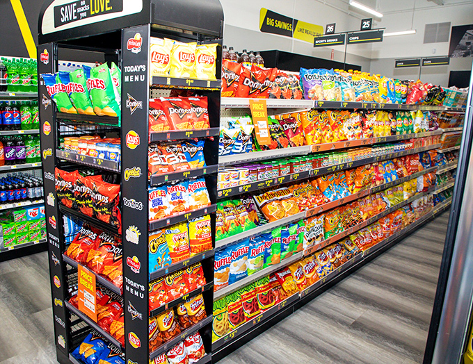 Snack paradise where diet intentions go to die. The chip aisle offers more flavor varieties than there are excuses for why you deserve "just one bag."