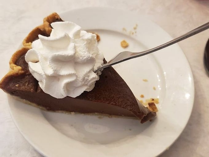 Chocolate chess pie with whipped cream: proof that heaven exists and it's located somewhere between your plate and your mouth.