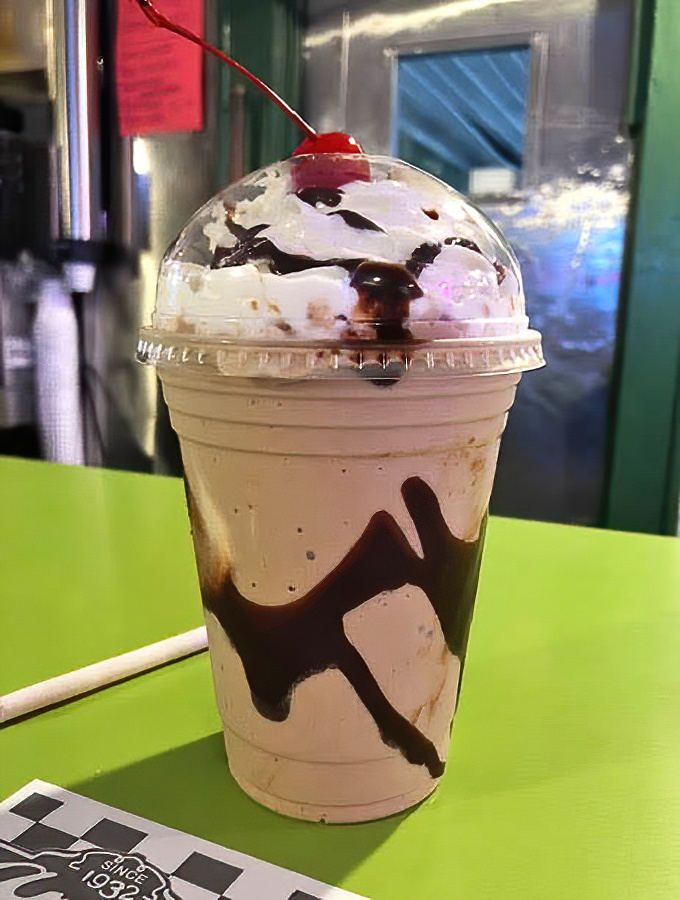 This chocolate milkshake isn't just Instagram-worthy; it's a drinkable dessert that demands respect and a sturdy straw.