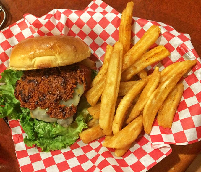 The burger that launched a thousand road trips. That crispy exterior gives way to juicy perfection inside&mdash;a textural masterpiece on a bun.