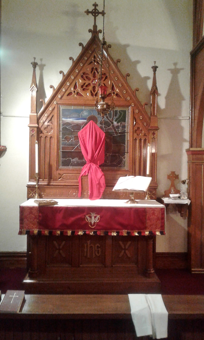 The ornate altar at this local church reflects Mount Carmel's rich spiritual heritage, where faith communities provide both guidance and practical support.