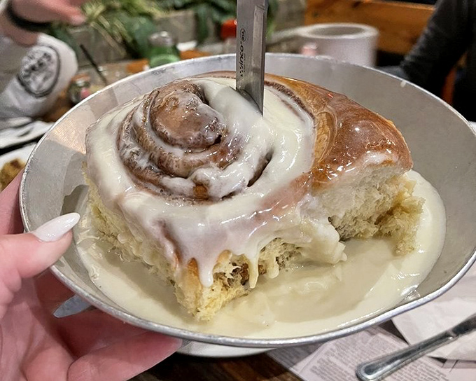 Cinnamon roll or architectural wonder? When icing cascades like Niagara Falls over spirals of cinnamon-sugar heaven, definitions become deliciously blurred.