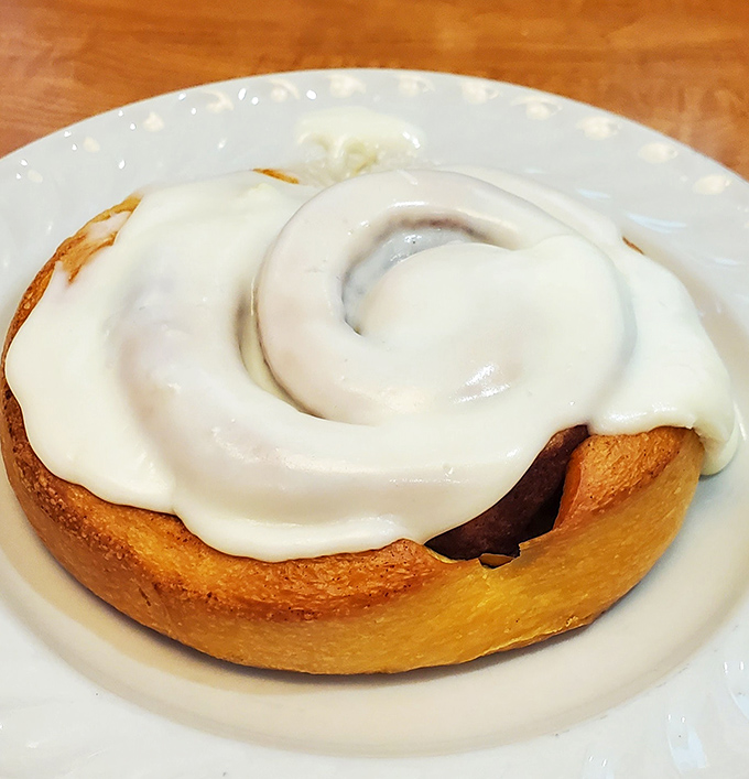 This isn't just a cinnamon roll&mdash;it's what other cinnamon rolls dream of becoming when they grow up. That frosting swirl deserves its own Instagram.
