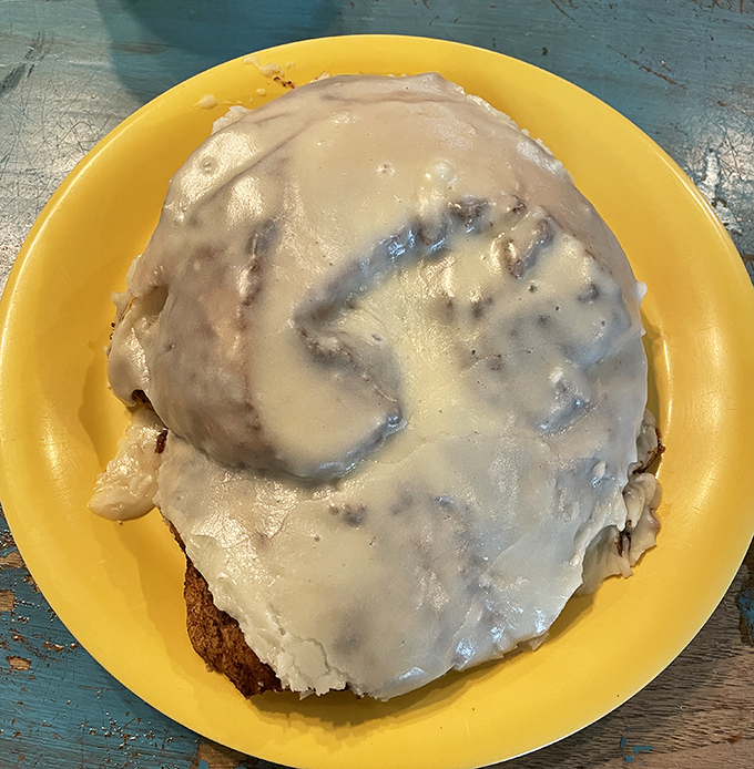 Not all cinnamon rolls are created equal. This one looks like it's wearing a cream cheese crown and isn't afraid to flaunt it.