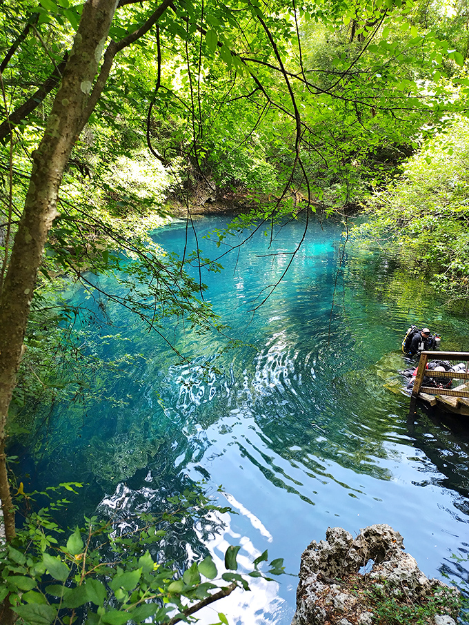 The spring's electric blue glow isn't special effects&mdash;it's just what happens when sunlight hits water this impossibly pure.