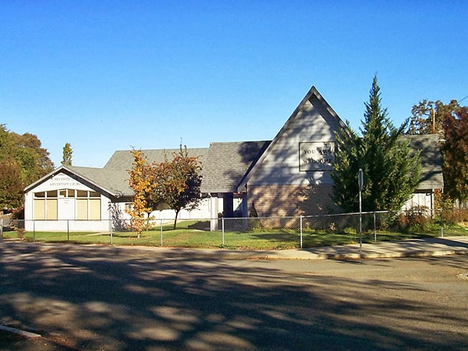 Small-town churches anchor communities like this one, offering both spiritual guidance and architectural charm against Clearlake's blue skies.