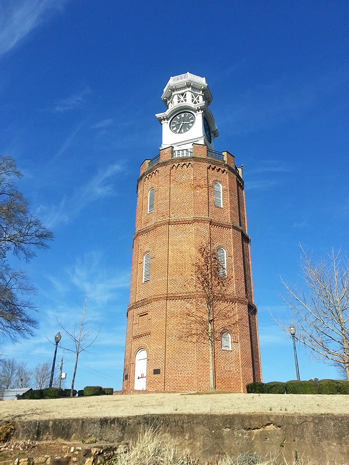 Rome's iconic clock tower stands like a brick sentinel watching over the city, keeping perfect time for generations of Romans rushing to dinner reservations.
