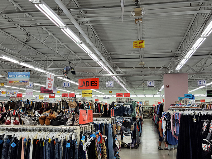 The ladies' section stretches toward the horizon, a color-coded wonderland where vintage treasures hide between last season's castoffs.