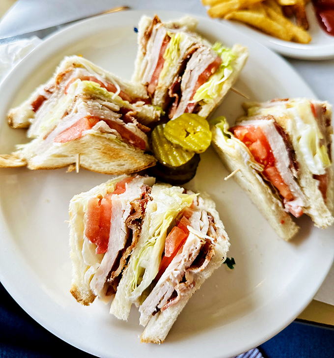 The club sandwich &ndash; architecture you can eat. Four perfect triangles arranged like they're posing for their yearbook photo.