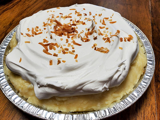 This coconut cream pie doesn't just satisfy a sweet tooth—it creates a tropical vacation in your mouth. The toasted coconut flakes are like little postcards from paradise.