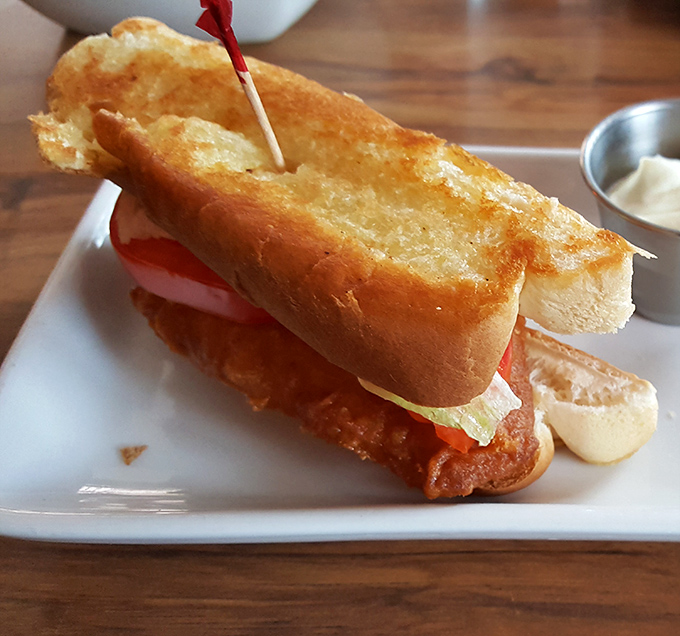 Not just a sandwich, but an engineering marvel&mdash;crispy fish, fresh toppings, and a pillowy roll that somehow manages to contain the deliciousness without surrendering to sogginess.