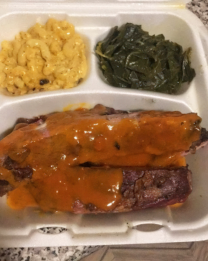 Collard greens that have clearly been introduced to smoked meat and decided to start a beautiful friendship. Vegetable redemption at its finest.