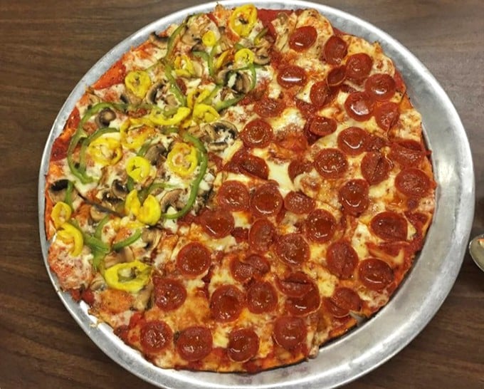 Half veggie explosion, half pepperoni paradise—Columbus-style pizza doesn't ask you to choose between worlds when you can happily inhabit both.