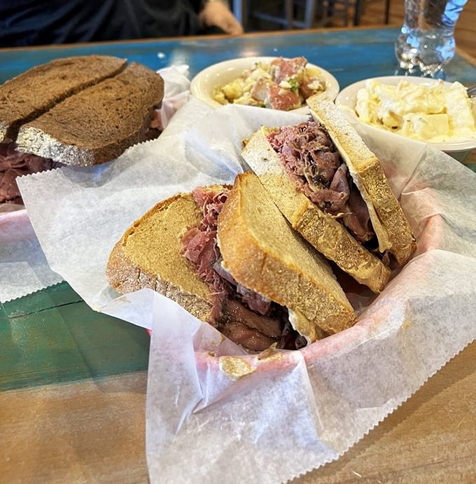 Stacked higher than your weekend reading pile, this sandwich doesn't just satisfy hunger&mdash;it conquers it. The bread is merely the delivery system for meat perfection. 