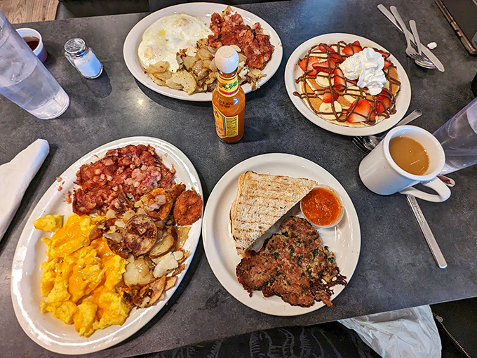 Breakfast spread that would make Ron Swanson weep with joy &ndash; eggs, potatoes, and enough protein to fuel a small army.