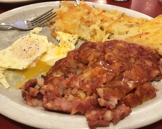 Corned beef hash that doesn't hide behind pretense&mdash;just honest, hearty chunks mingling with perfectly runny eggs and golden hash browns.