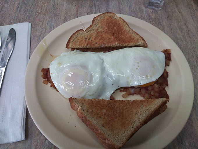 The breakfast equivalent of hitting the jackpot. Crispy corned beef hash topped with perfectly sunny eggs&mdash;comfort food that hugs you from the inside.