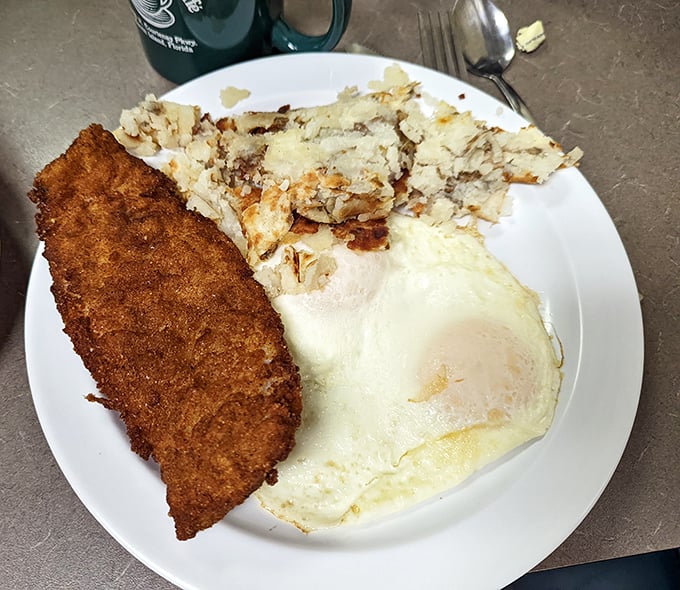 Country fried steak: where breakfast meets comfort food in a beautiful marriage officiated by gravy.