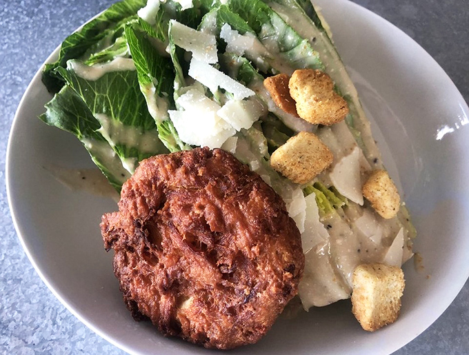A proper Maryland crabcake&mdash;mostly crab, minimal filler, and absolutely zero apologies for being exactly what it should be.
