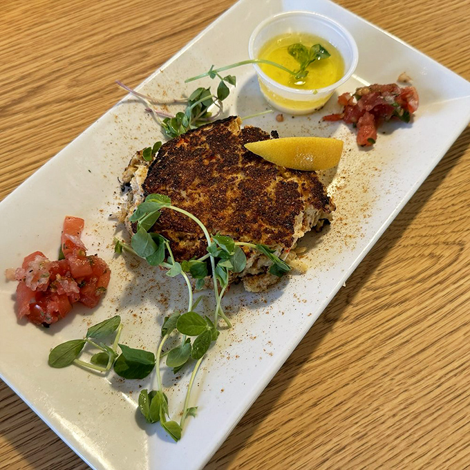 This isn't just a crab cake&mdash;it's a crab mansion. Minimal filler, maximum flavor, and that blackened crust deserves its own love song.