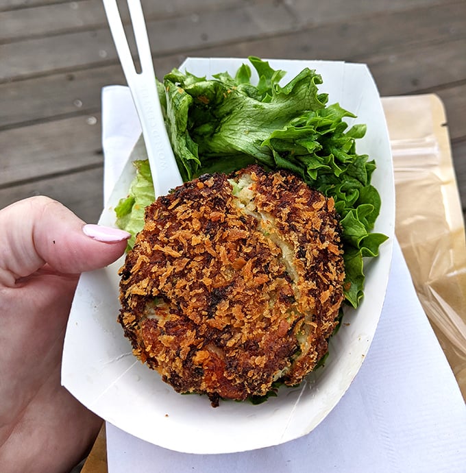 Golden-crusted crab cake perfection that makes you wonder if there's a Nobel Prize category for seafood craftsmanship.
